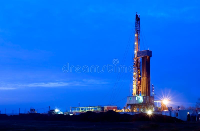 Oil well at night stock photo. Image of industry, energy - 19376774