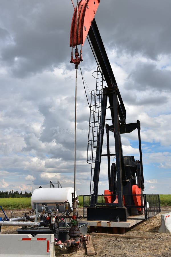 Old Oil and Gas Pump Jack stock photo. Image of field - 123258110