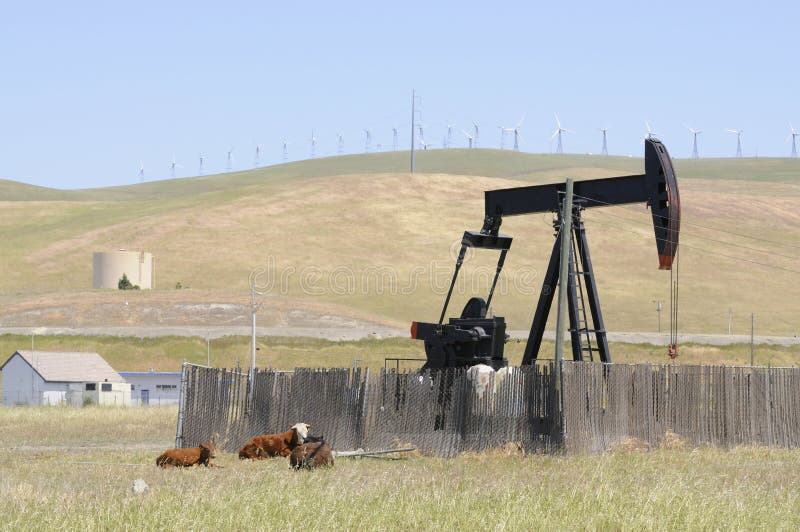Oil Well Pump with Wind Generators Stock Image - Image of power ...