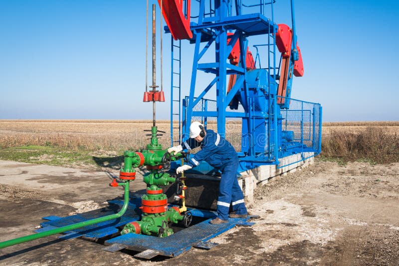 Oil worker check oil pump stock image. Image of employee - 46946551