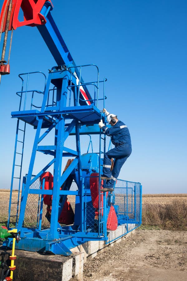 Oil worker check oil pump stock photo. Image of dirt - 46946738