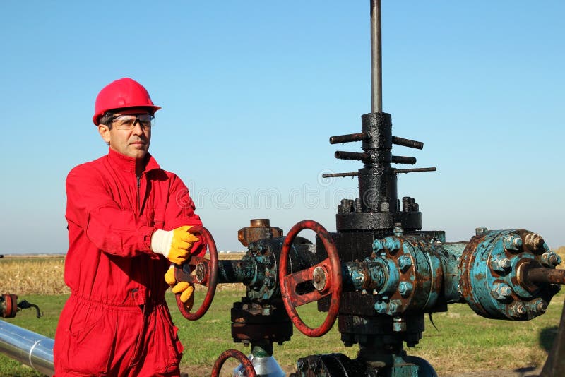 Oil Rig Valve Technician at Work Stock Image - Image of crude, gloves ...