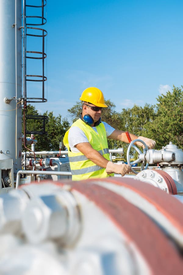 Oil Worker in Industrial Oil Stock Image - Image of chemical, engineer ...