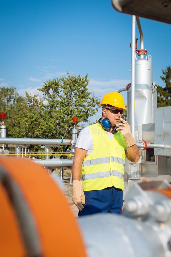 Oil Worker in Industrial Oil Stock Photo - Image of environment ...