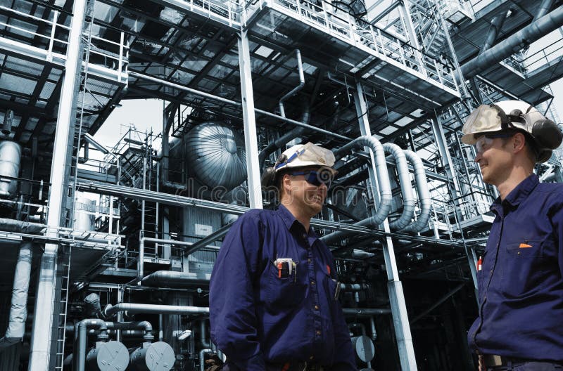 Oil Workers Inside Large Chemical Refinery Stock Image - Image of ...
