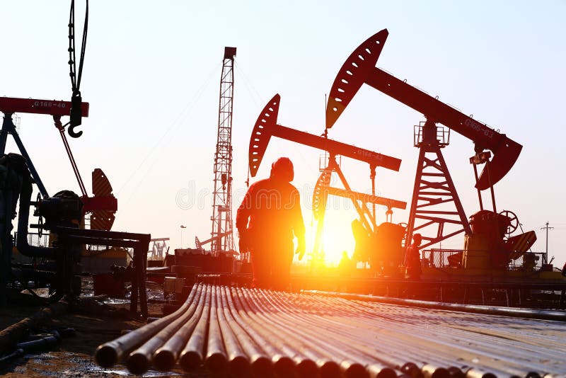 The oil workers at work stock image. Image of refineries - 220439909