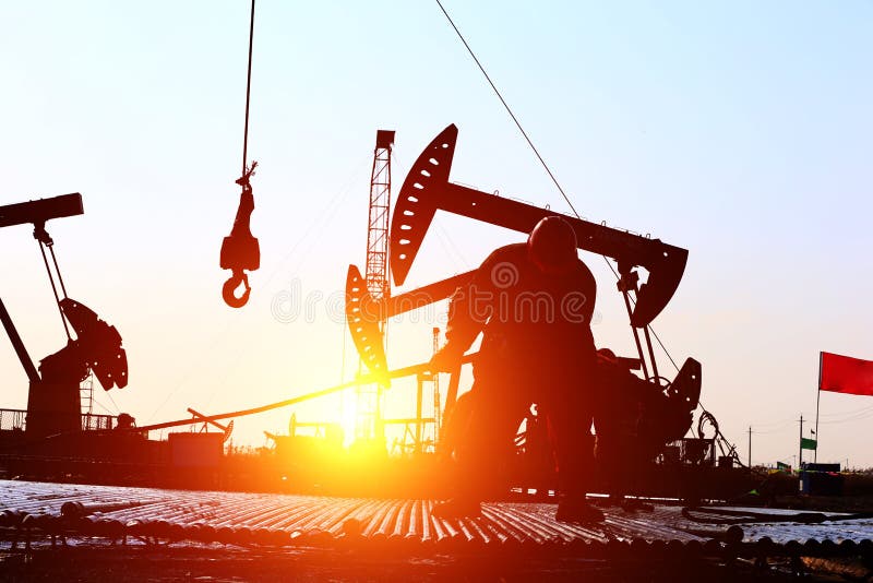 The oil workers at work stock image. Image of ability - 220439913