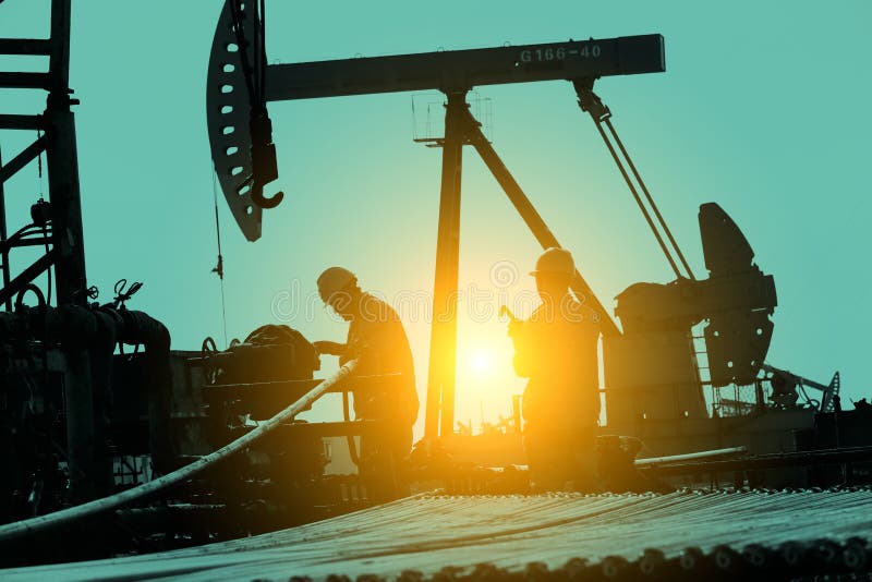 The oil workers at work editorial image. Image of engineering - 220440525