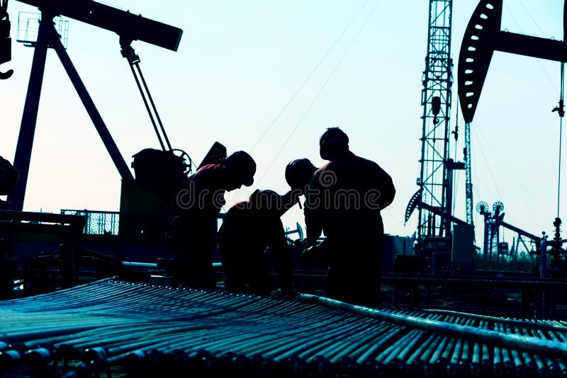The oil workers at work stock photo. Image of drilling - 237354098