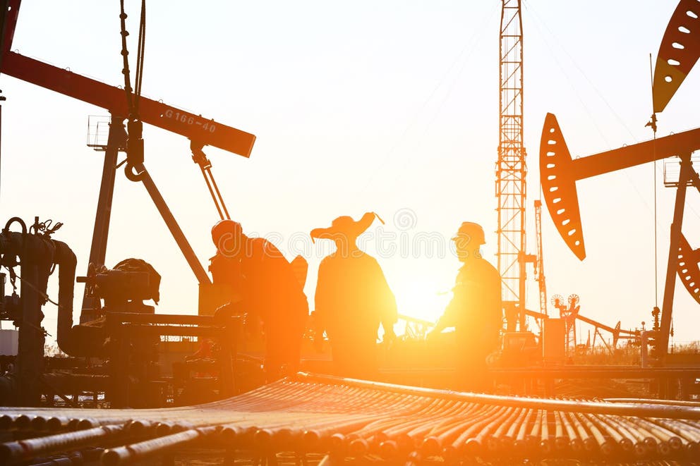 The oil workers at work stock image. Image of business - 346430753