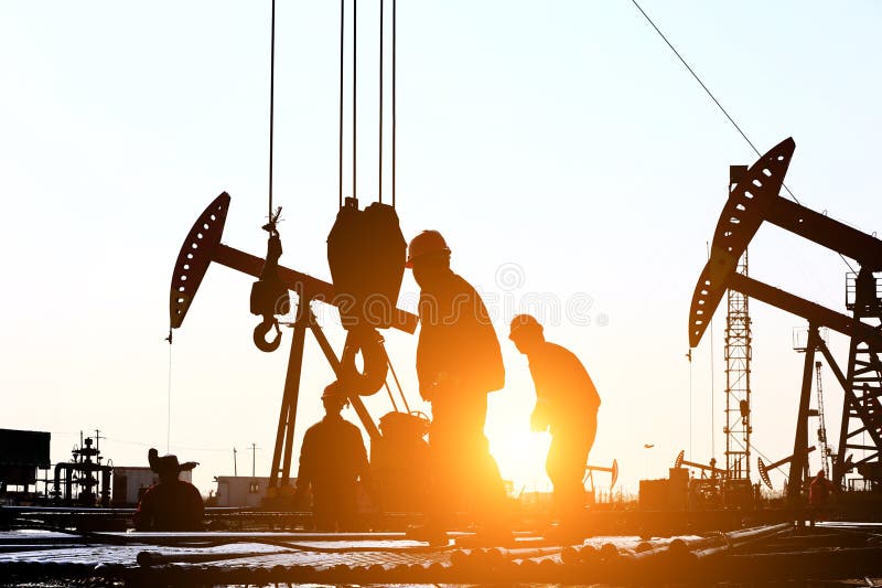 The oil workers at work stock photo. Image of helmets - 350855396