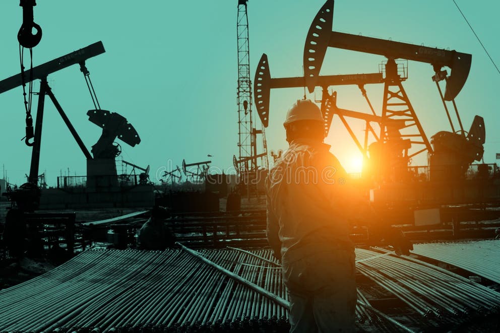 The oil workers at work stock image. Image of machines - 353145777