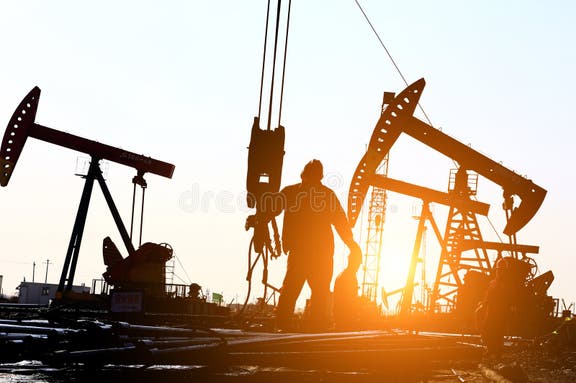 The oil workers at work editorial image. Image of technology - 375110715