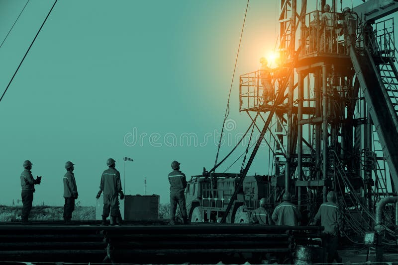 The Oil Workers are Working Stock Image - Image of evening, equipment ...