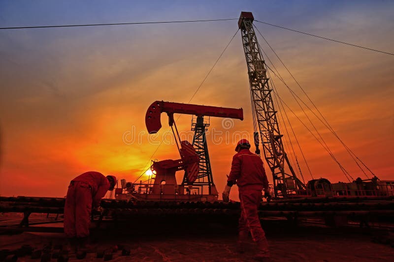 The Oil Workers are Working Editorial Photography - Image of gasoline ...