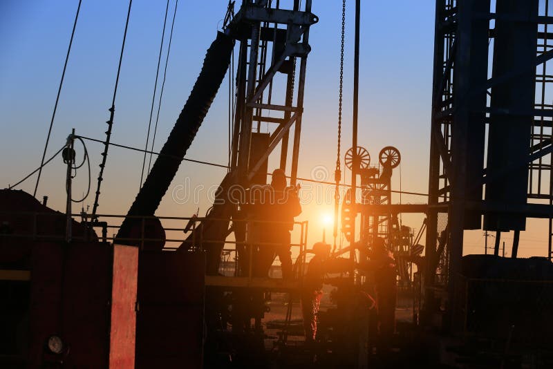 The Oil Workers are Working Stock Photo - Image of evening, pump: 255997300