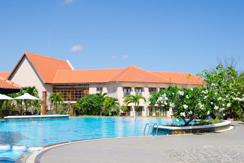 Hotel with swimming pool stock image. Image of house - 29802689