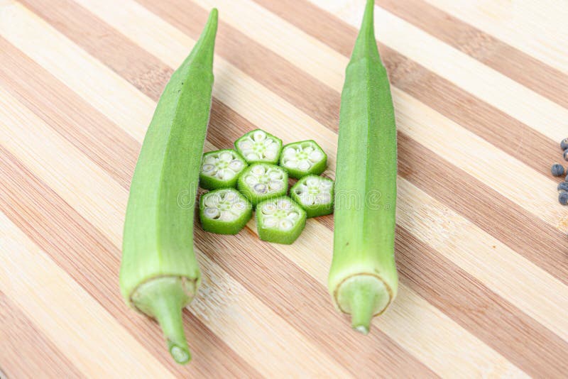 Okra Stock with Slice on Farm Stock Photo - Image of homemade ...