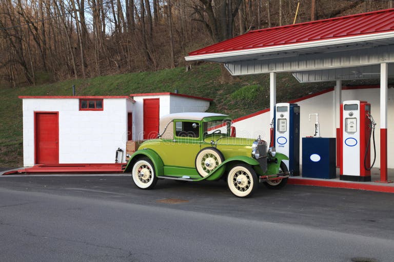 Old 1930 car getting gas stock photo. Image of black - 19934046