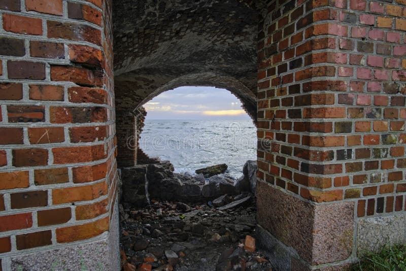 Old Abandoned Brick Military Fort with Broken Wall and View Sea. Stock ...