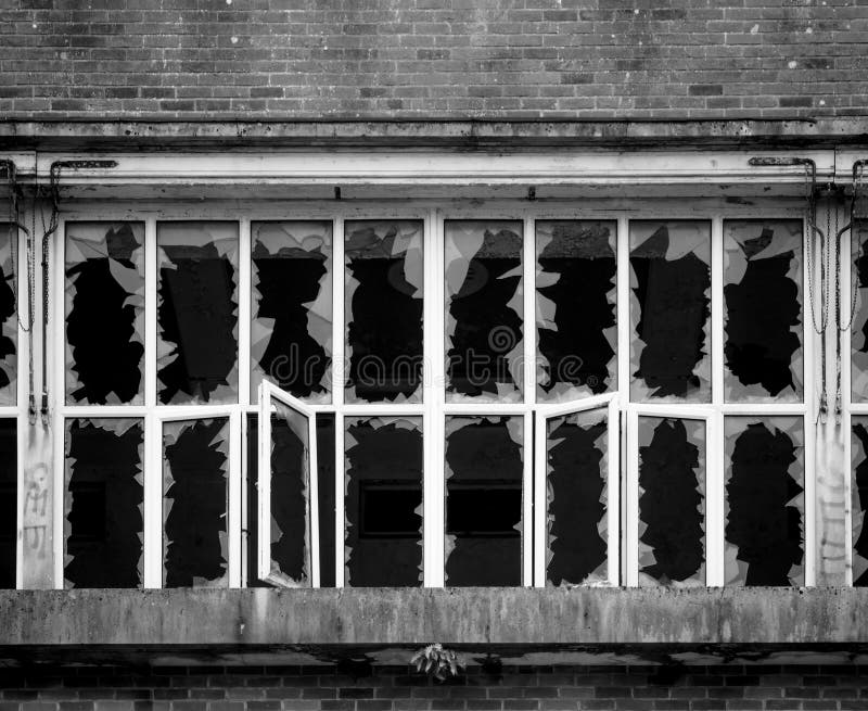 Old Abandoned Building with Broken, Smashed, Windows. Stock Photo ...