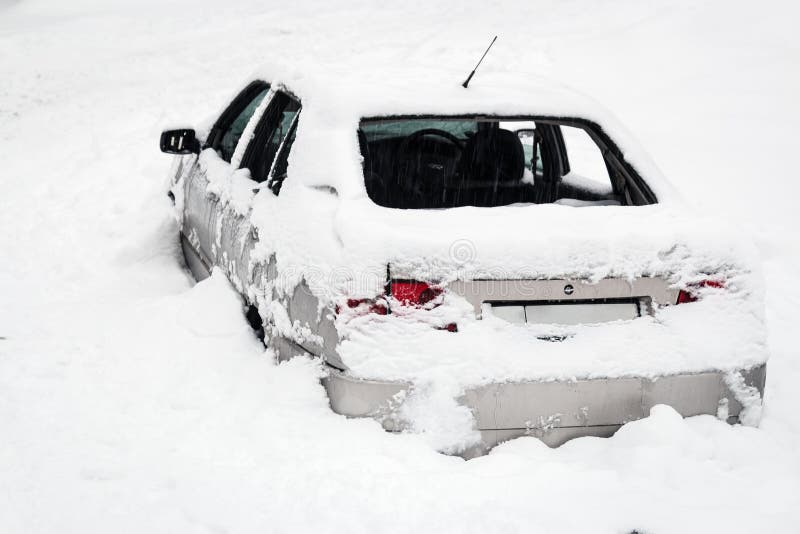 Old Abandoned Car without Glass and Wheels in the Snow Stock Photo ...