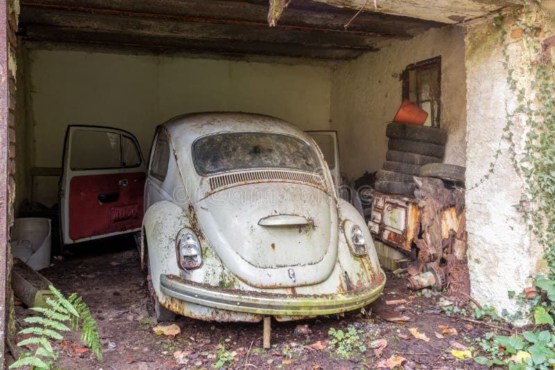 Old Abandoned Classic Vintage Car in a Garage Stock Image - Image of ...