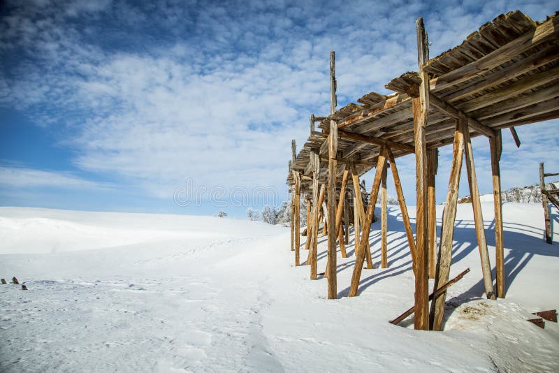 An Old, Abandoned Copper Mine Building in the Snowy Landscape Stock ...