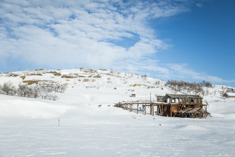 An Old, Abandoned Copper Mine Building in the Snowy Landscape Stock ...
