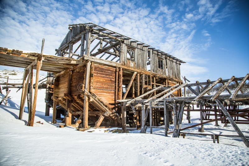 An Old, Abandoned Copper Mine Building in the Snowy Landscape Stock ...