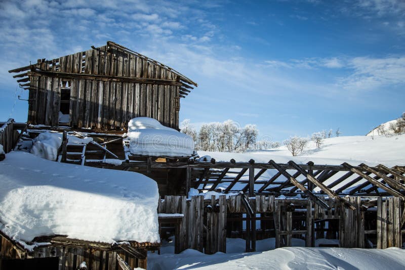 An Old, Abandoned Copper Mine Building in the Snowy Landscape Stock ...