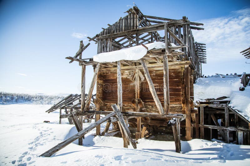 An Old, Abandoned Copper Mine Building in the Snowy Landscape Stock ...