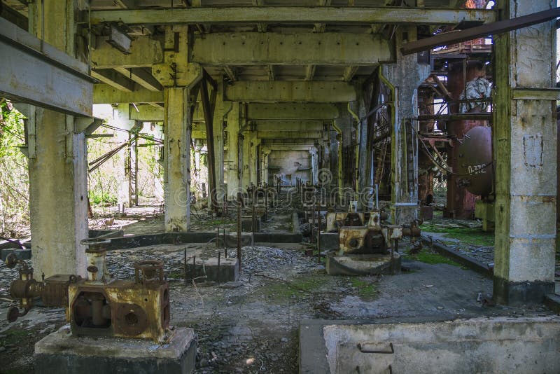 Old Abandoned Factory with Rusty Remains of Equipment Stock Photo ...