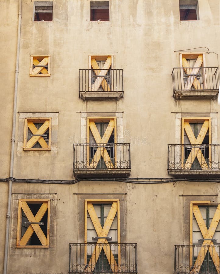 Old Abandoned High-rise Building with Boarded Up Windows Stock Image ...
