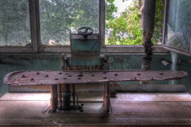 Old Abandoned Laundry Ironing Machine in Stock Photo - Image of ...