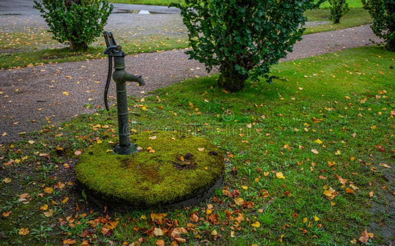 Old and Abandoned Mechanical Water Post.. Stock Image - Image of ...