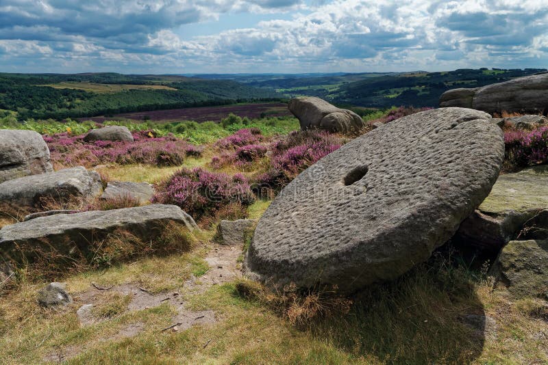 Abandoned Old Millstone with Rusted Metal Rim Isolated Stock Photo ...