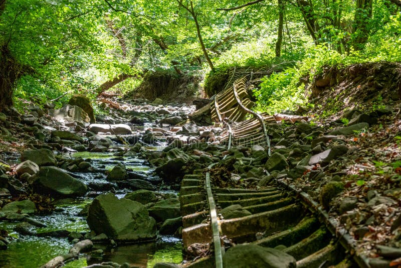 Old Abandoned Mining Train Rails in the Dark Forest Stock Image - Image ...