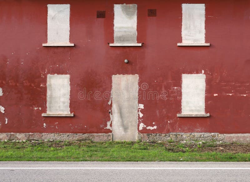 Old Abandoned Red Plaster Building with Windows and Door Walled. Street ...