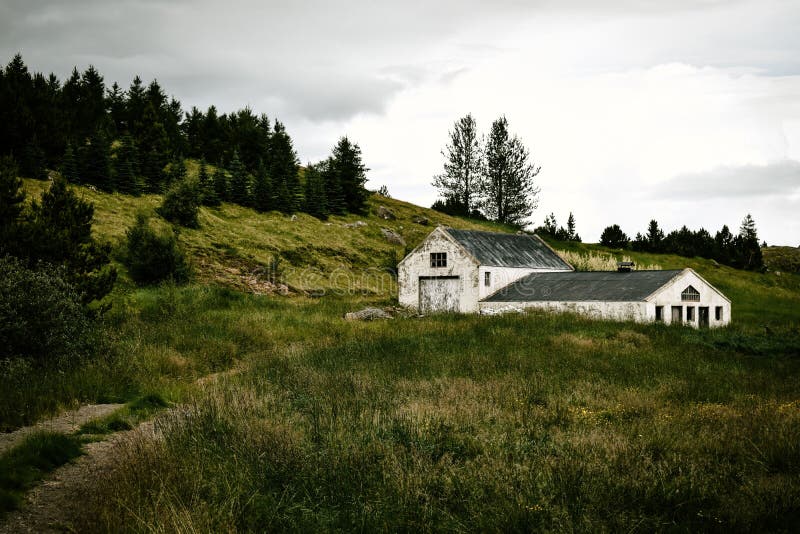 Old Abandoned Rural House Surrounded by Green Vegetation. Stock Image ...