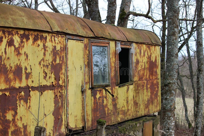 Old Abandoned Rusted Vagon House Property in a Forest Stock Image ...