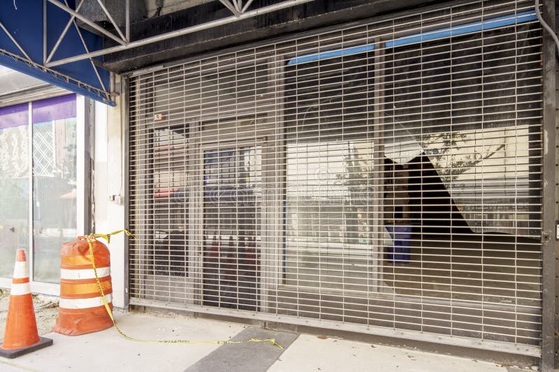 Old Abandoned Store at Downtown Miami with Broken Glass and Fence Stock ...