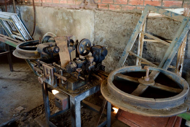 An Old and Abandoned Workshop with a Rusty Bending Pipe Machine Stock ...