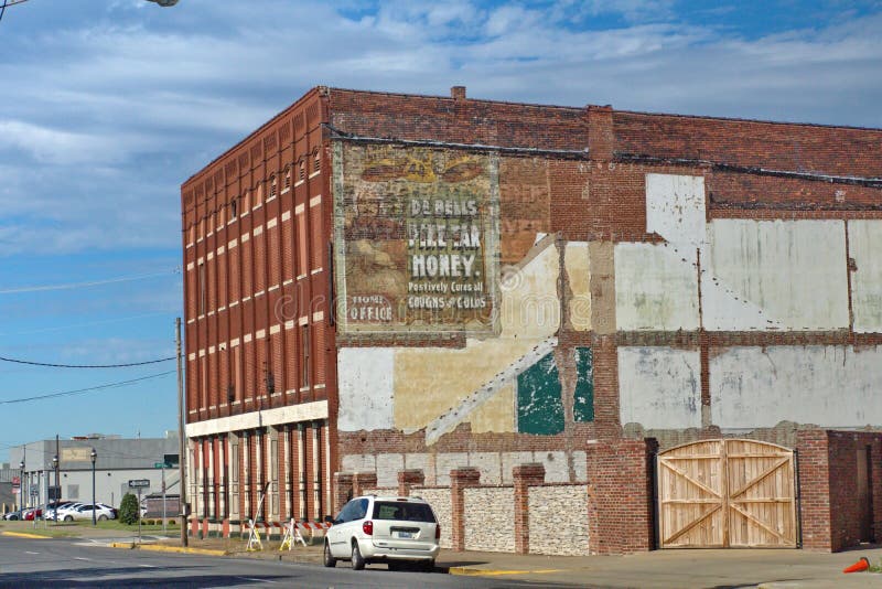 Old Advertisement on the Side of a Building Editorial Stock Photo ...