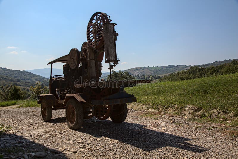 An Old Agricultural Machine on a Gravel Road Stock Photo - Image of ...