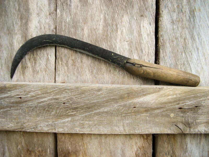 Old Agricultural Sickle on a Wooden Plank Stock Image - Image of ...