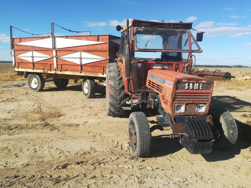 Old tractor in the field editorial photography. Image of transport ...
