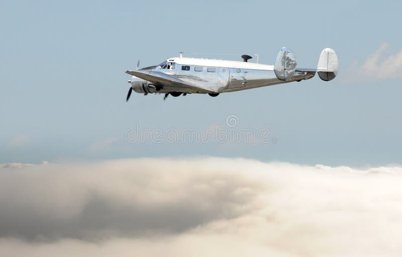 Old airplane in flight stock image. Image of flight, metallic - 13471871