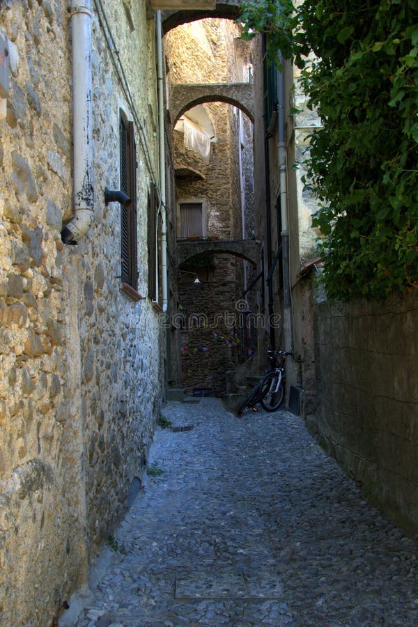 Old alley in Italy stock image. Image of alley, alleyway - 57590081