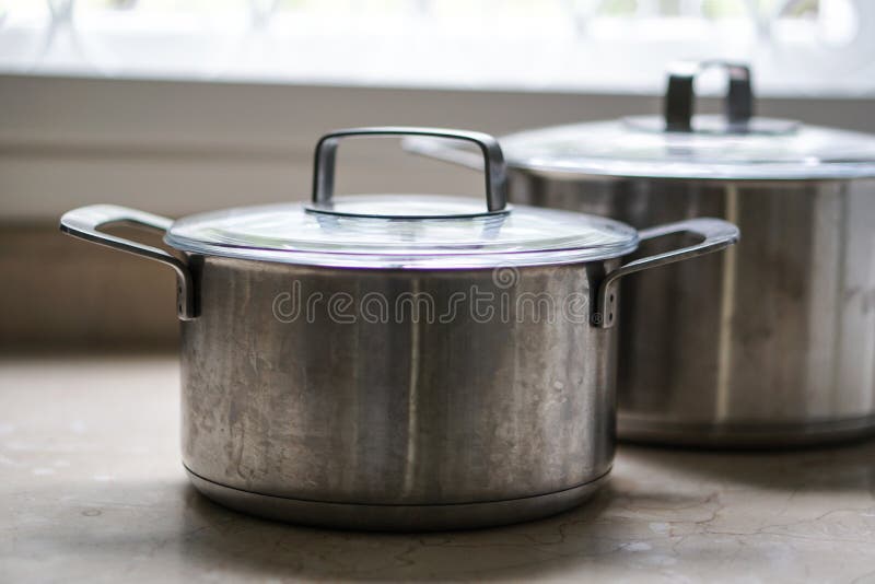 Old Aluminum Stainless Steel Cooking Pot on Kitchen Table Stock Image ...